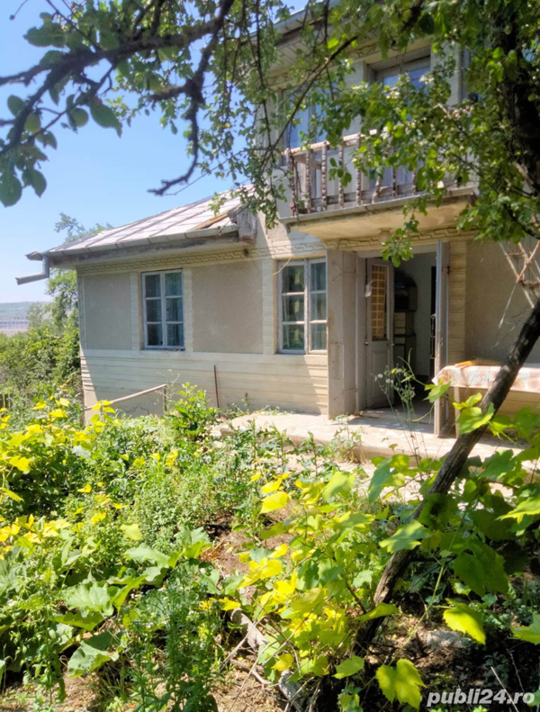 Vand casa 3 camere cam. 70 mp • Podu Turcului Bacau